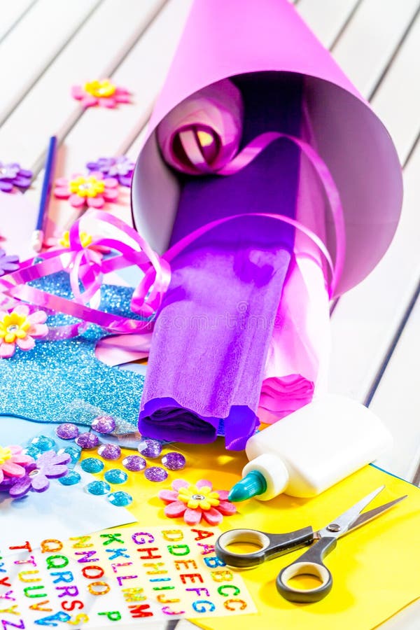 Crafting a Candy Cone from Paper for the First Day of School Stock ...