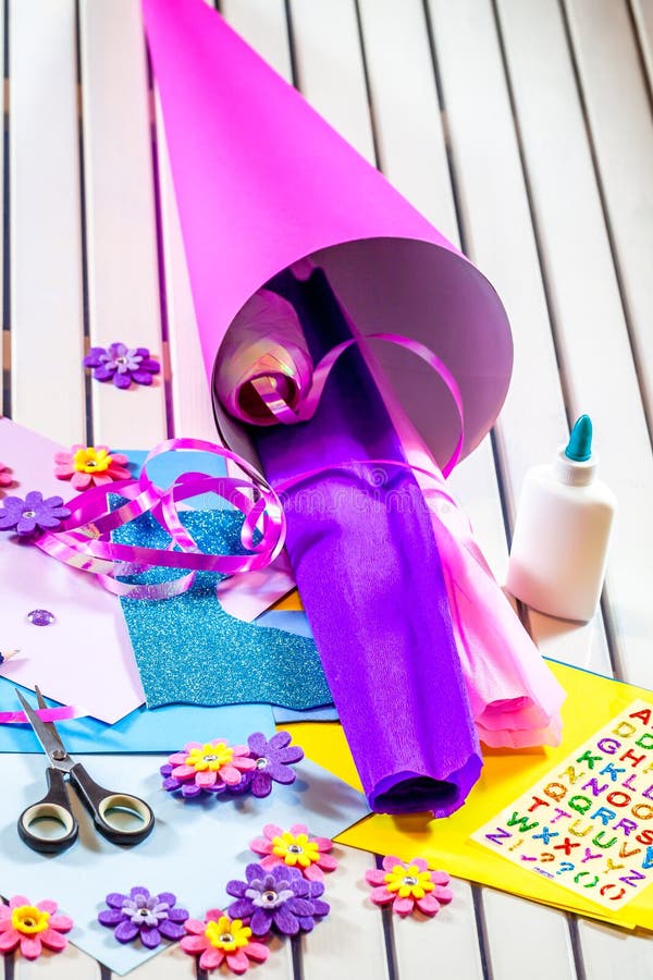 Crafting a Candy Cone from Paper for the First Day of School Stock ...