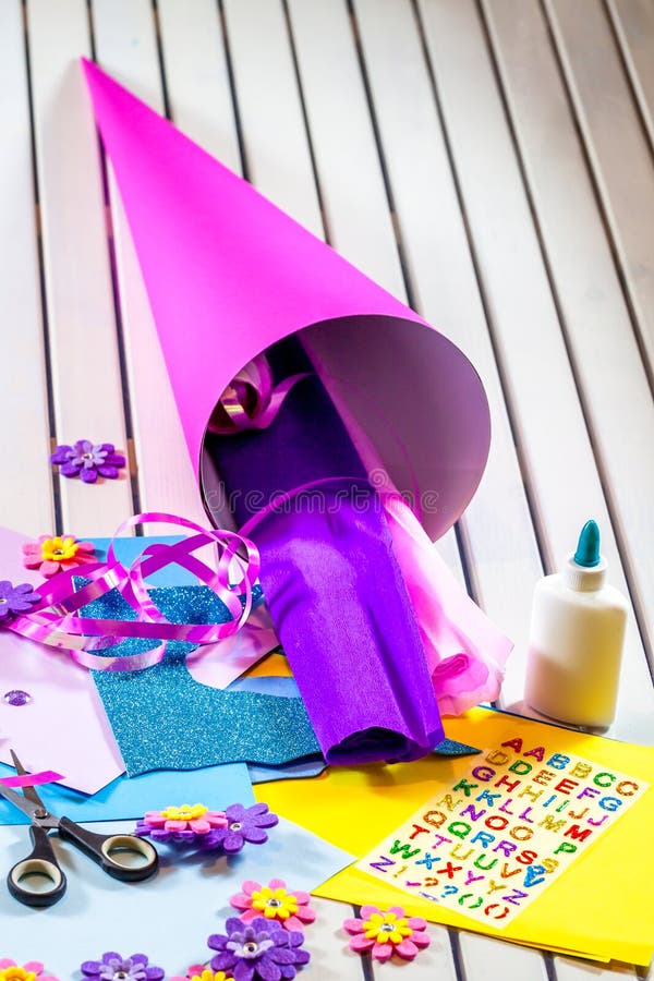 Crafting a Candy Cone from Paper for the First Day of School Stock ...