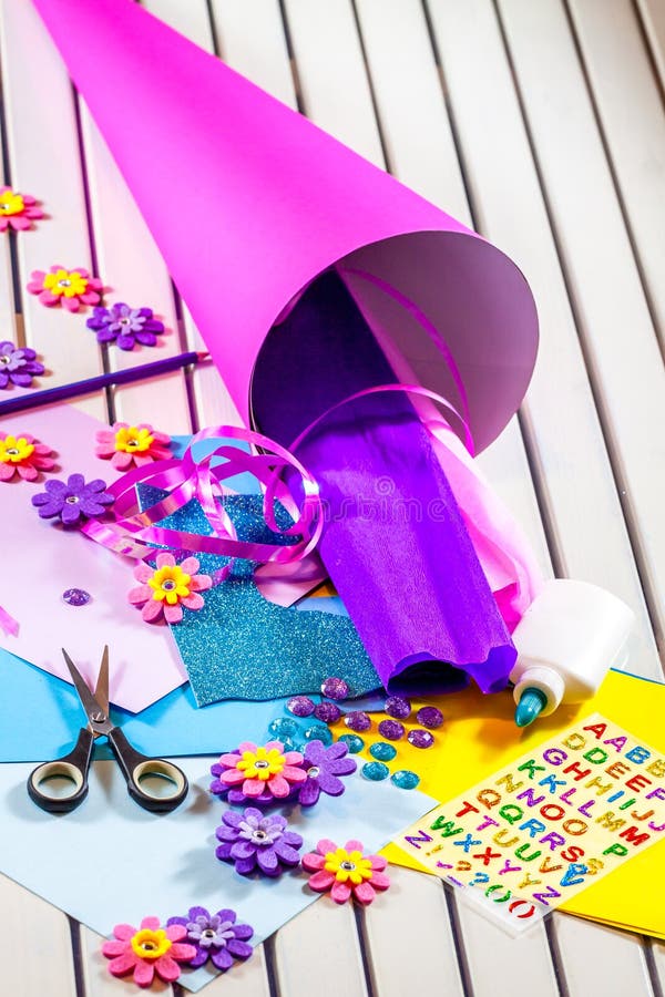 Crafting a Candy Cone from Paper for the First Day of School Stock ...