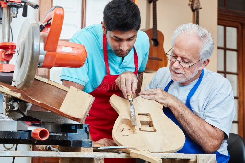 Craftsman and Apprentice at Workshop Stock Image - Image of construction, internship: 108152473