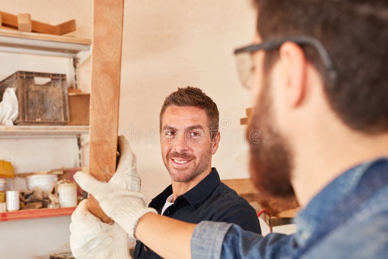 Craftsman Apprentices Work Together Stock Photo - Image of joiner, processing: 160736070