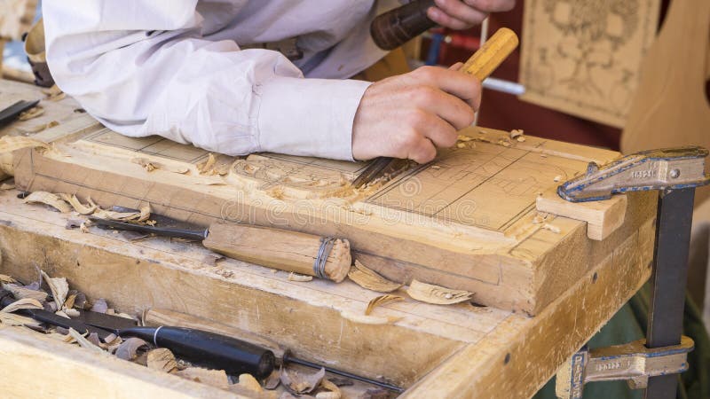 Craftsman Carving Wood in a Medieval Fair, Carpentry Tools Stock Image ...