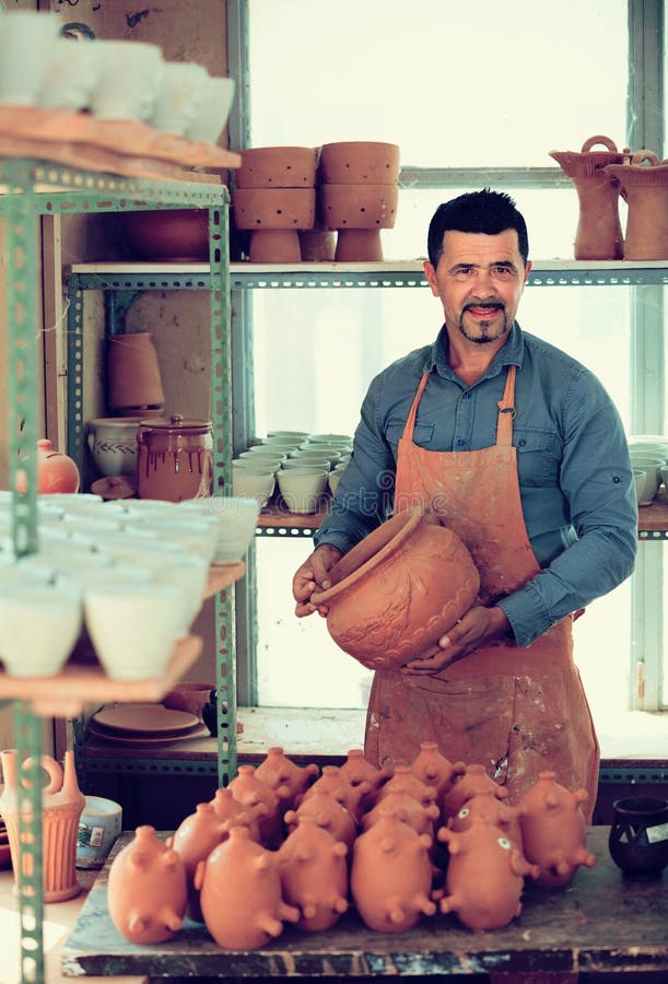 Craftsman with Ceramic Crockery Stock Image - Image of mature, kiln ...