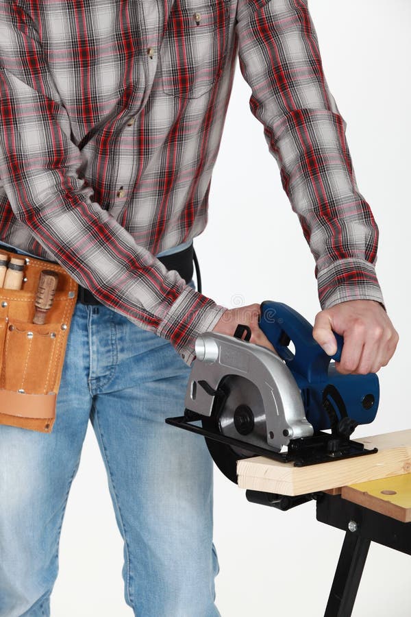 Craftsman with chainsaw stock image. Image of campaign - 30593509