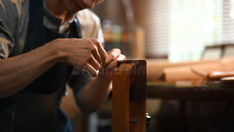 Craftsman Creating Product Sewing Leather with Needle and Thread in ...