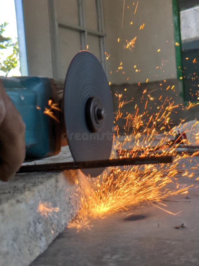 A Craftsman is Cutting Iron Stock Photo - Image of sparks, craftsman ...