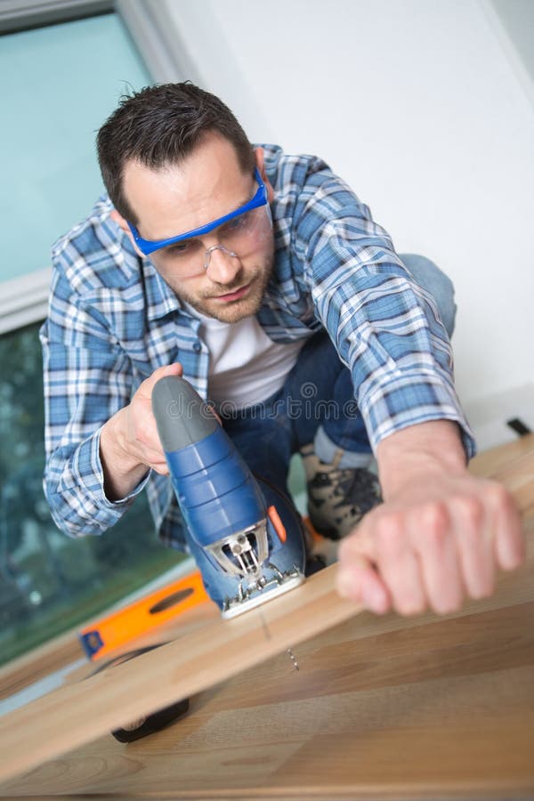 Craftsman Cutting Wooden Plank Stock Image - Image of carpentry ...