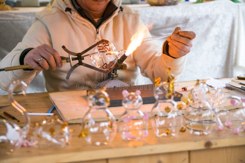 Craftsman Decorating Glass Objects with a Torch Stock Photo - Image of ...