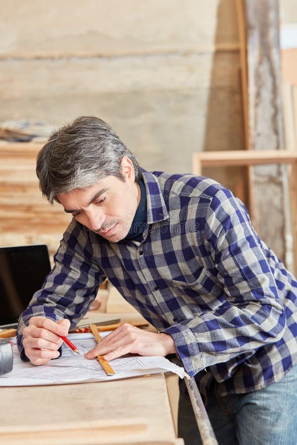 Craftsman Drawing and Planning Floorplan Stock Photo - Image of artisan ...