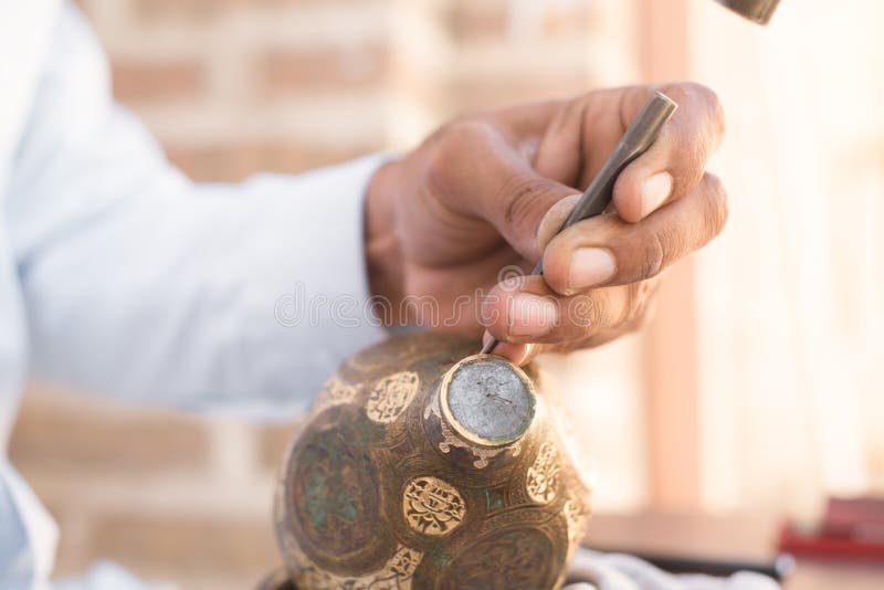 Chaser of copper at work stock photo. Image of gold - 119234142