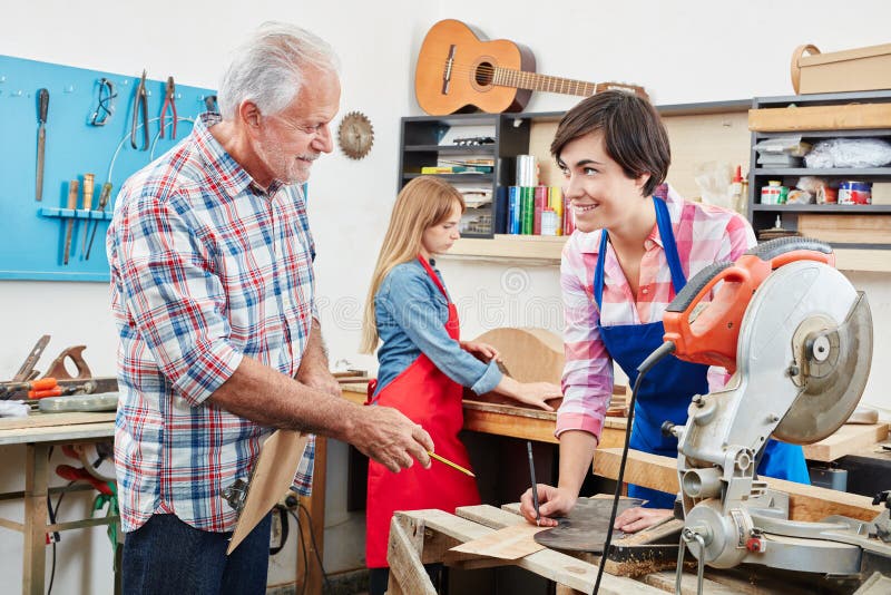 Craftsman Evaluating Apprentice Stock Photo - Image of apprentice ...