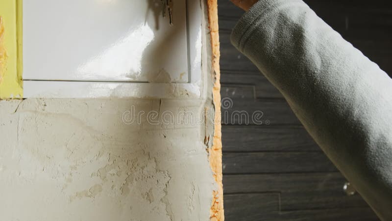 Craftsman Evens Out Layers of Plaster on Wall during Renovation Stock ...