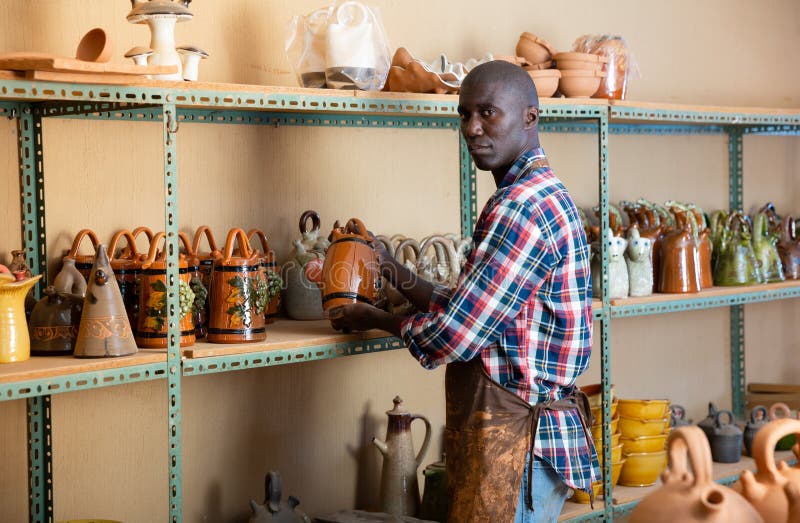 Craftsman Examining Handmade Earthenware Stock Image - Image of emotion ...