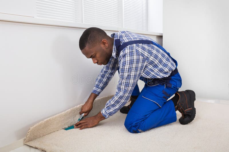 Carpet fitting with tools stock image. Image of object - 38586059