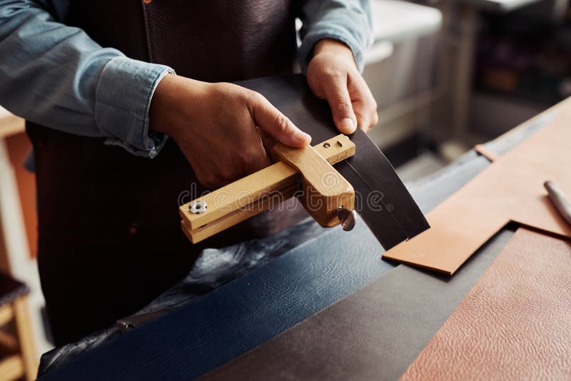 Craftsman Measuring Leather Stock Photo - Image of skill, manufactory ...