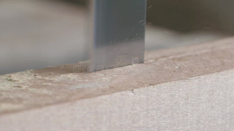 Precision Cutting of Wood Using a Sharp Blade in a Workshop Stock ...