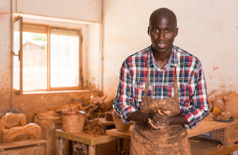 Craftsman in Pottery Workshop Stock Photo - Image of ceramist, people ...