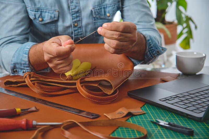 Craftsman Preparing Thread for Sewing Leather Bag in Workshop Stock ...