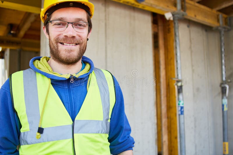 Craftsman in Protective Clothing on the Construction Site Stock Photo ...