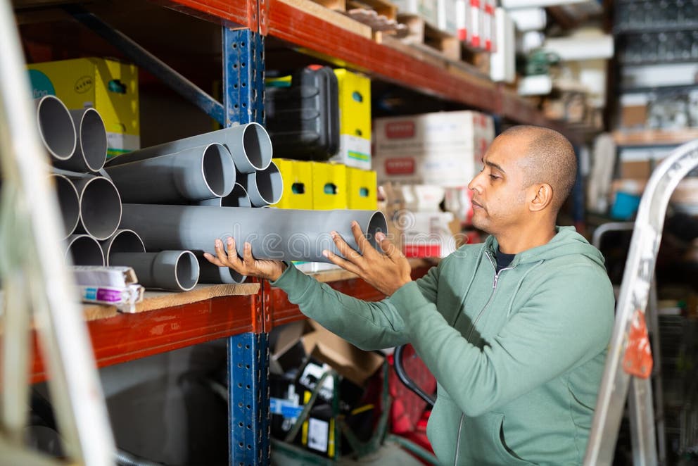 Craftsman Selects Plastic Plumbing Pipes in Hardware Store Stock Image ...