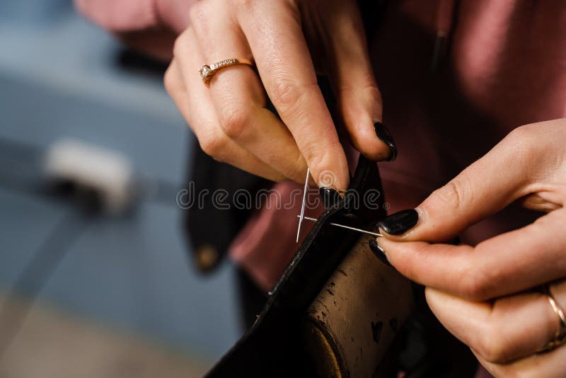 Craftsman Sews Genuine Leather Using Needle and Thread for Creation ...