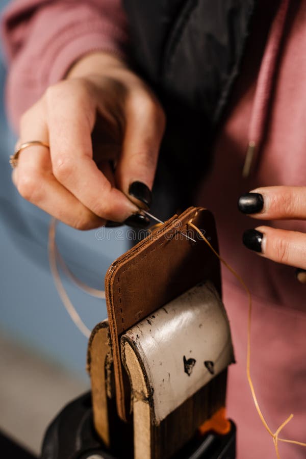 Craftsman Sews Genuine Leather Using Needle and Thread for Creation ...