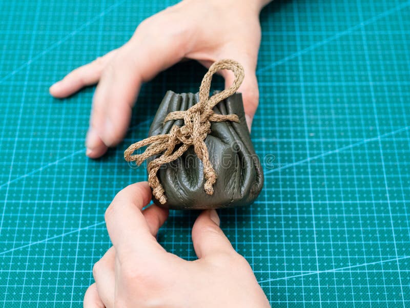Craftsman Shows Folded Knotted Drawstring Pouch Stock Photo - Image of ...