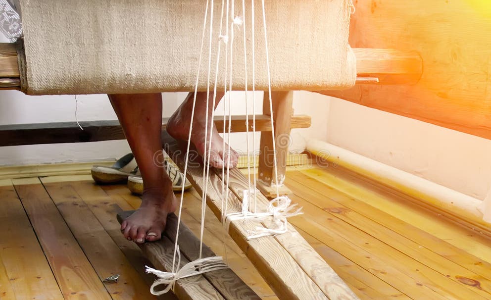 Weaving on Traditional Loom with Bare Feet and Wooden Foot Support in a ...