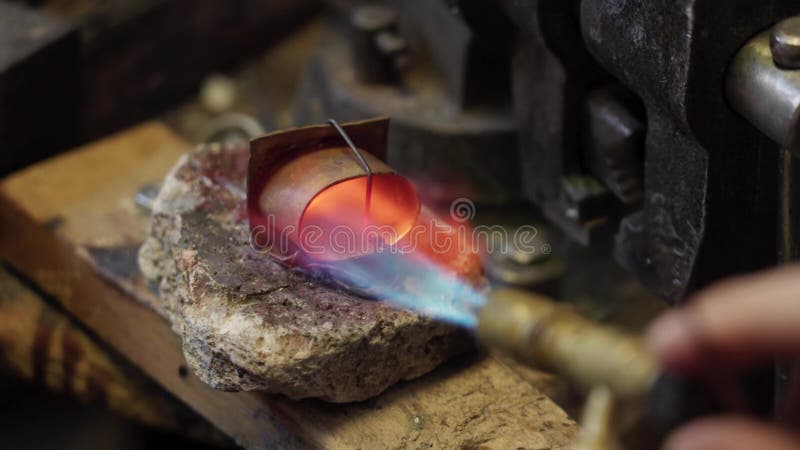 Craftsman Soldering the Tip of the Scabbard in the Workshop Stock Video ...