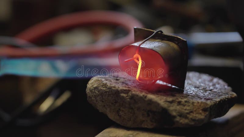 Craftsman Soldering the Tip of the Scabbard in the Workshop Stock Video ...