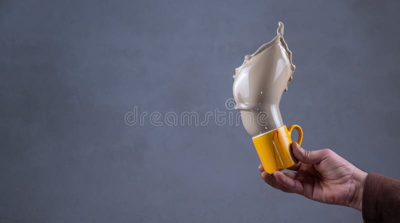 Craftsman Throwing Paint Splash on Wall from Yellow Cup - Creative ...