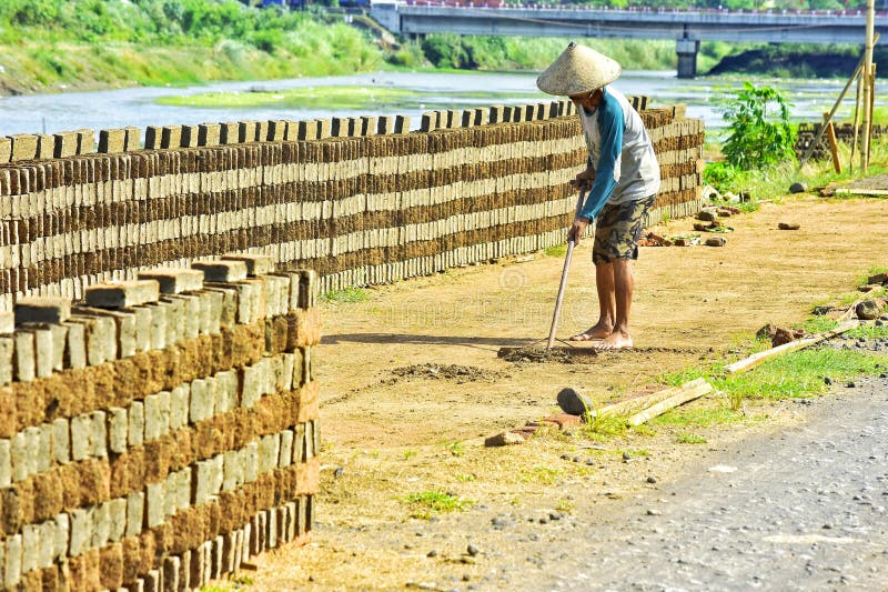 A Craftsman Who Makes Traditional Bricks from Clay in Kendal Regency ...