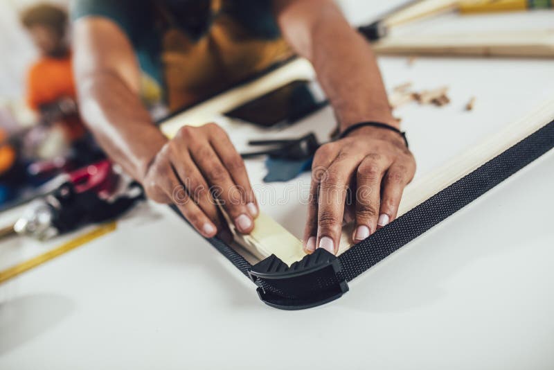 Craftsman Working on Frame for Picture Stock Photo - Image of home ...