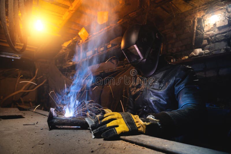Craftsman Works in His Old Garage on an Order, Metal Welding Stock ...