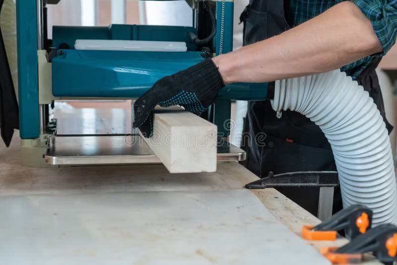 Craftsman Works on a Thicknessing Machine in a Workshop. Stock Image ...