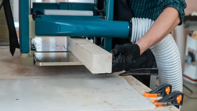 Craftsman Works on a Thicknessing Machine in a Workshop. Stock Image ...