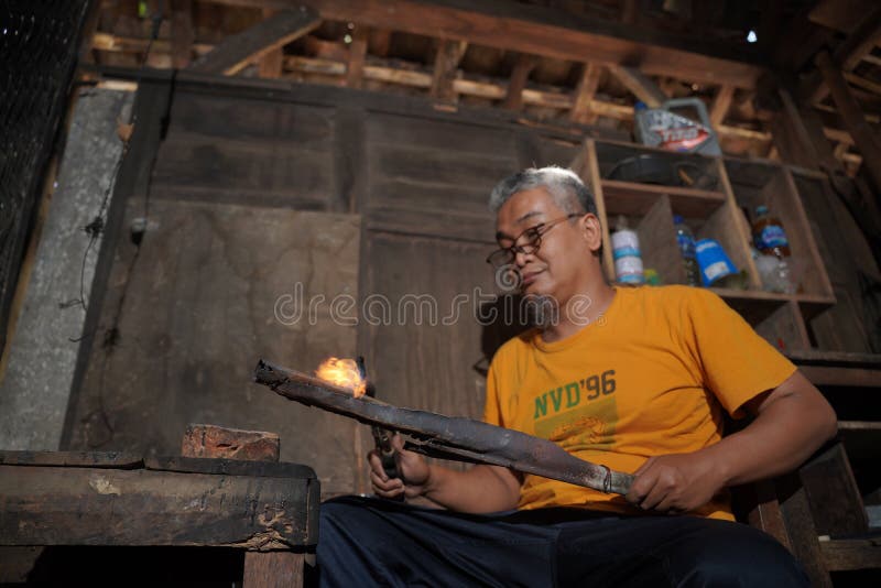 Craftsmen are Making Keris in the Workshop. Javanese Traditional Weapon ...