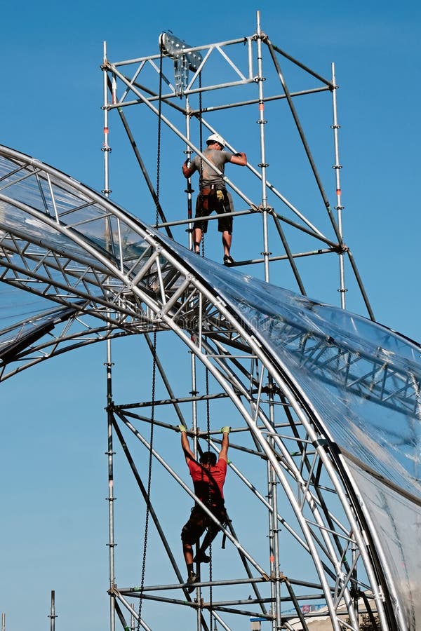 Craftsmen and Workers Working on a Scaffolding Editorial Stock Photo ...