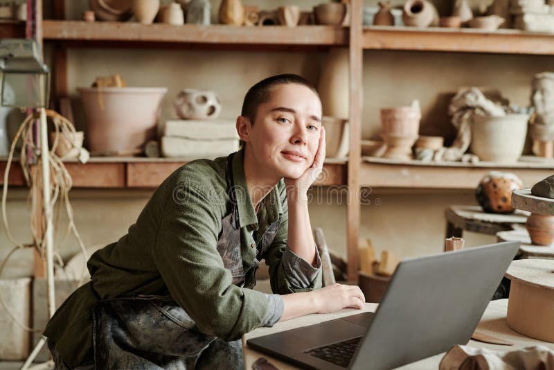 Craftsperson Working on Laptop in Studio Stock Image - Image of ...