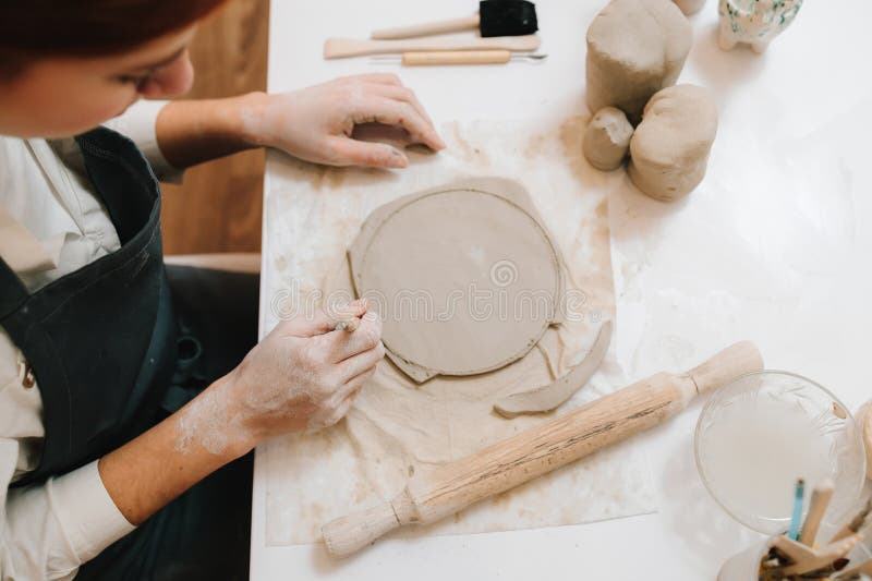 Craftswoman is Preparing for Clay Modeling, Closeup. Young Potter Cuts ...