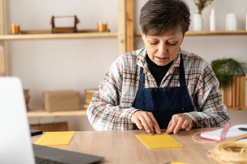 A Craftswoman Watching a Video Tutorial or Training Course on Making ...