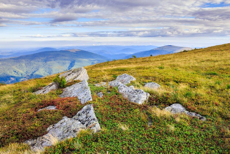 Craggy Rocks from the Grass on a Hillside Stock Image - Image of moss ...
