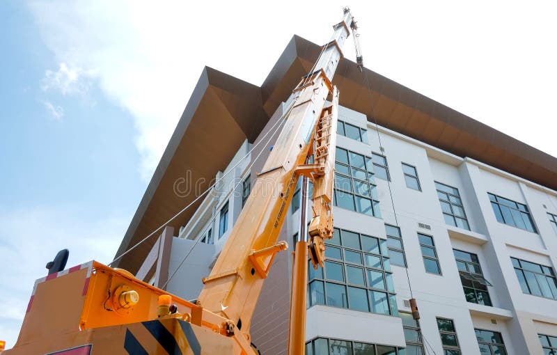 Crain Outside the Building. Stock Photo - Image of sefty, outdoor: 59450110