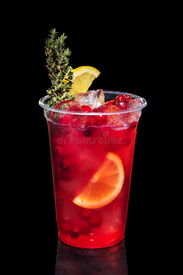 Cranberry Vodka Cocktail with Lemon and Rosemary Isolated on Black ...