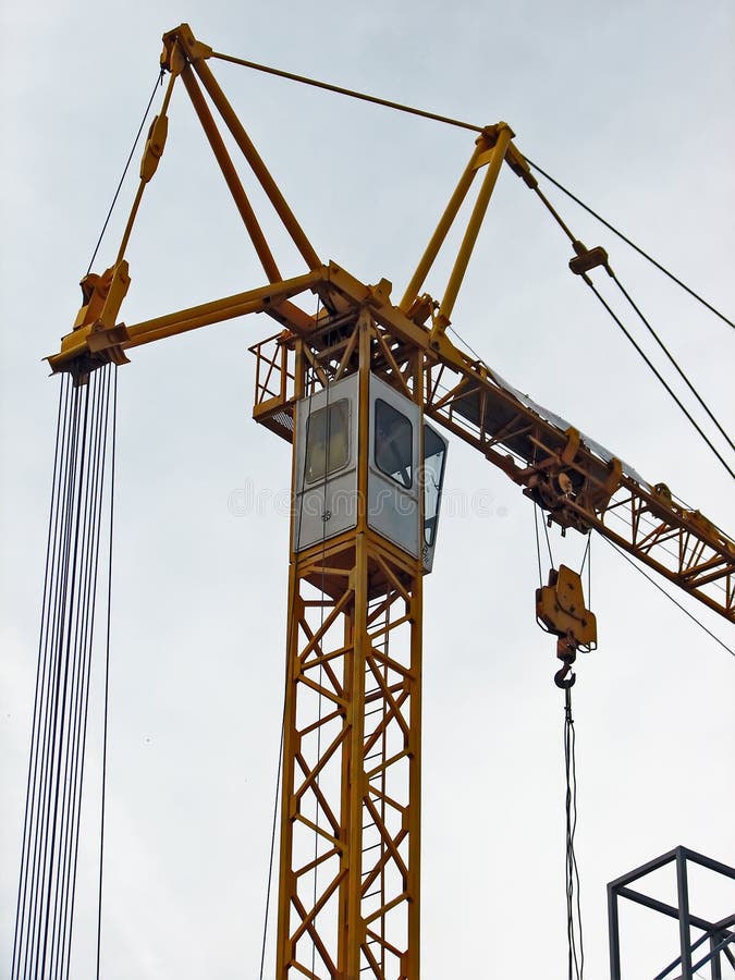 Industrial Crane Operating and Lifting an Electric Generator Stock ...