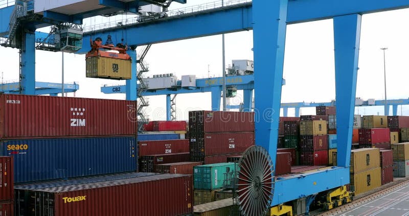Container Terminal during Loading and Unloading Cargo Containers. Stock ... Container Terminal during Loading and Unloading Cargo Containers. Stock ...