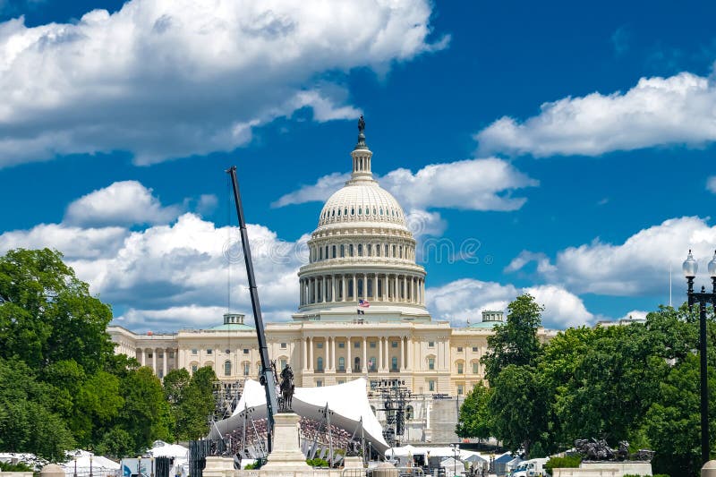 Crane is Being Used To Erect a Stage in Front of the Capitol Building ...