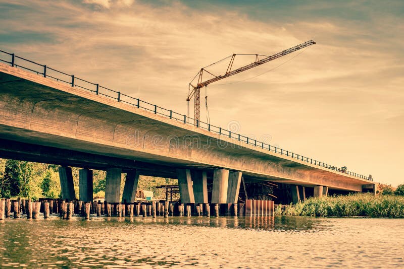Crane at a Bridge Construction Stock Photo - Image of highway, rail ...