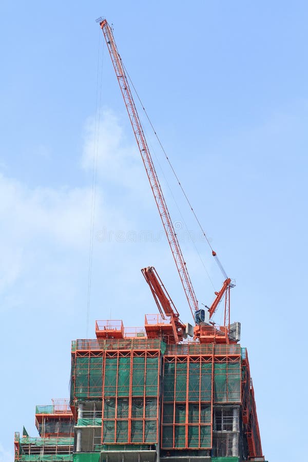 Crane and Building Construction Stock Photo - Image of machinery, hoist ...